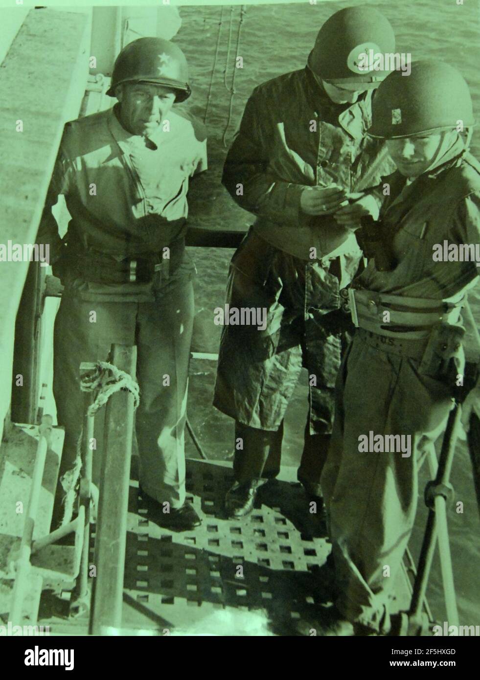 RADM Alan G. Kirk, watches MG Tory H. Middleton head ashore, Sicilian ...