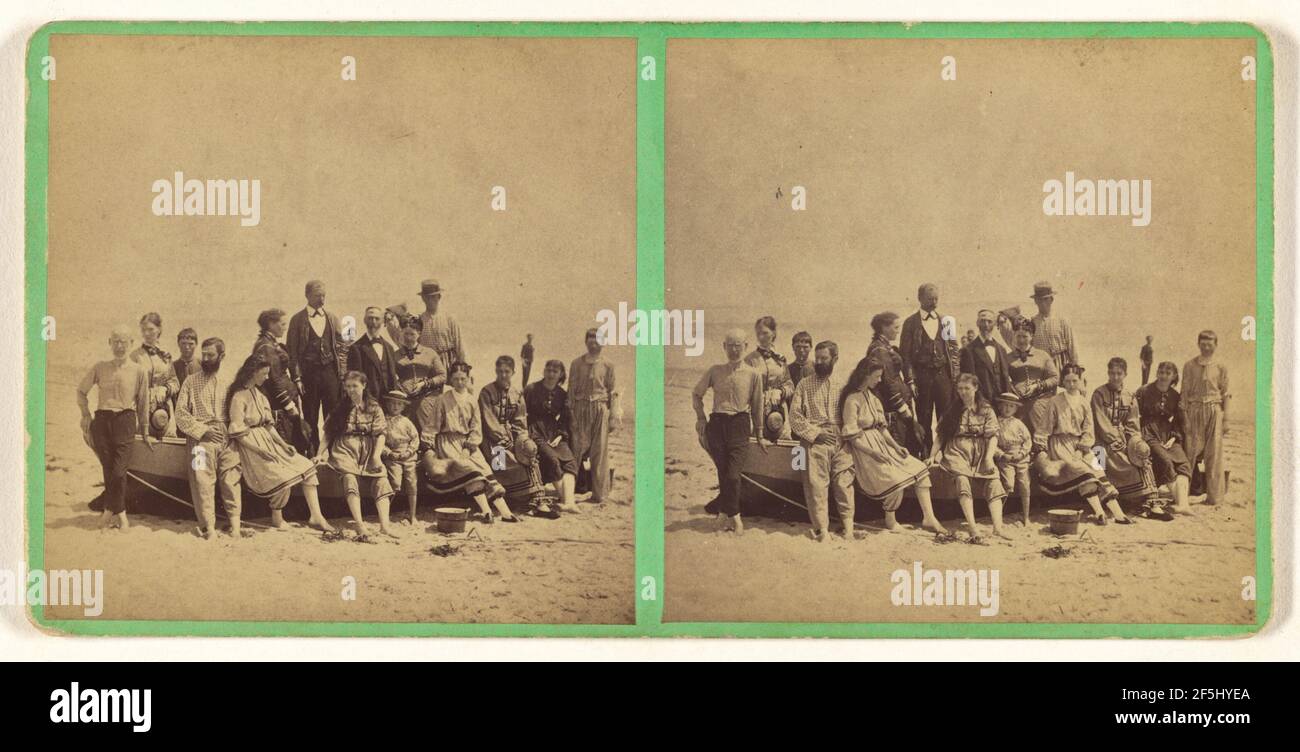 Group of people posed on an unidentified beach. Unknown maker, American ...