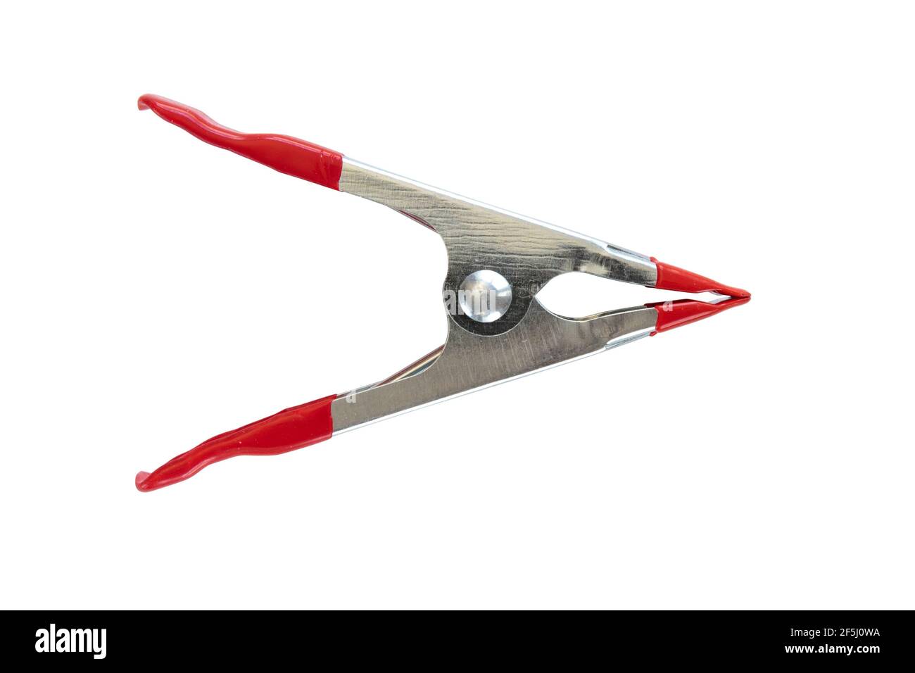 Metal spring clamp with red plastic on handles and tip. Clamping ...