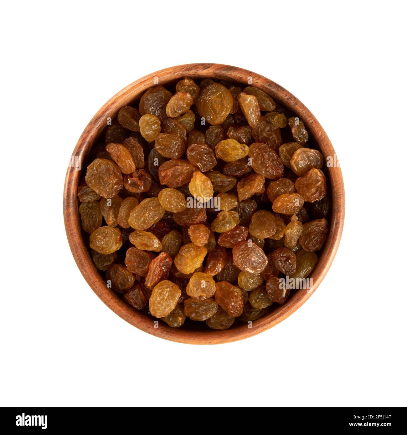 Heap of sweet raisins in wood bowl isolated on white background. Dried ...