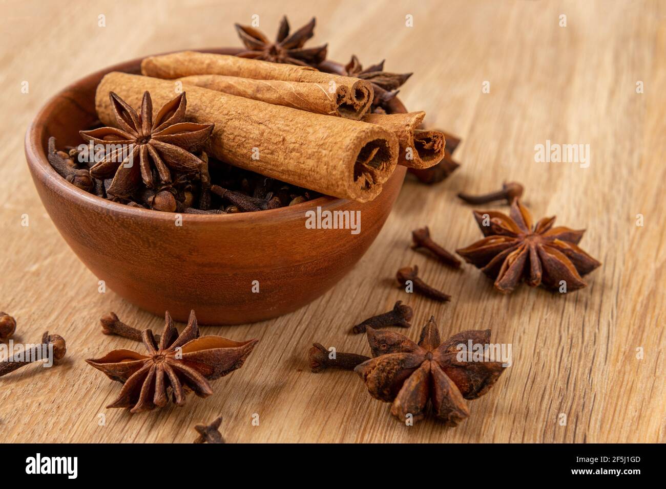 Spices for mulled wine: cinnamon sticks, star anise, carnation are in a ...