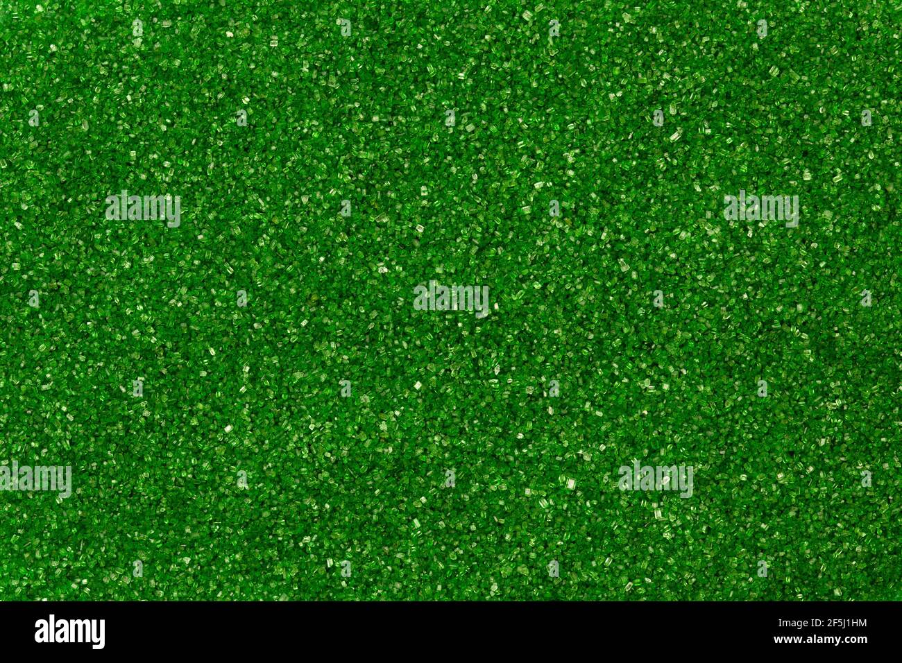 Green colored sugar - green seamless texture. Green crystals backdrop ...