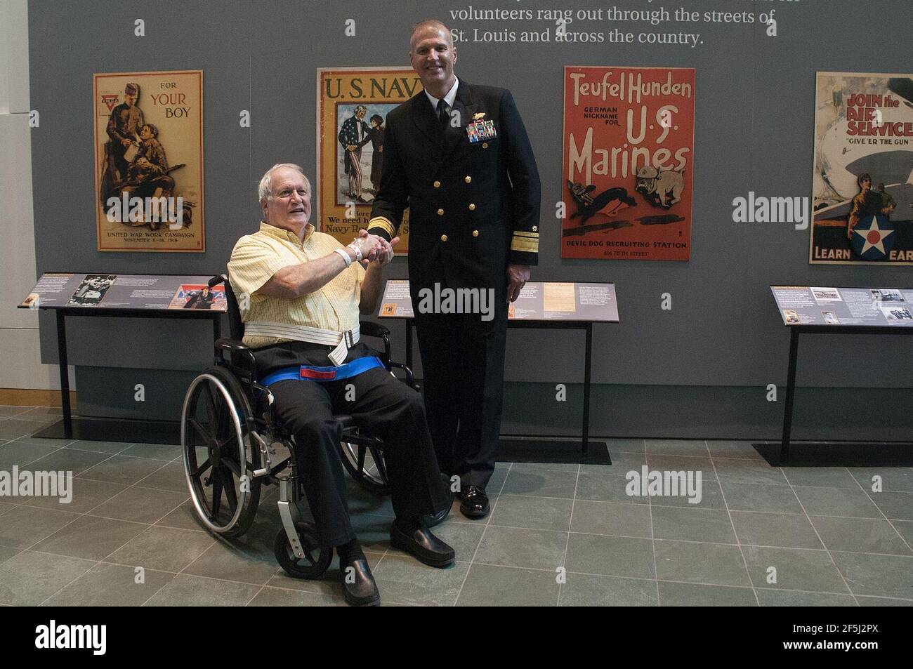 Rear Adm. Bret Muilenburg and Retired Capt. Jim Shelton pose for a ...