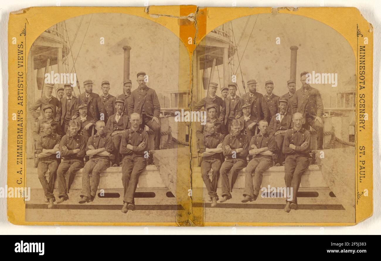 Group of men posed on bow of a steamboat. Charles A. Zimmerman ...