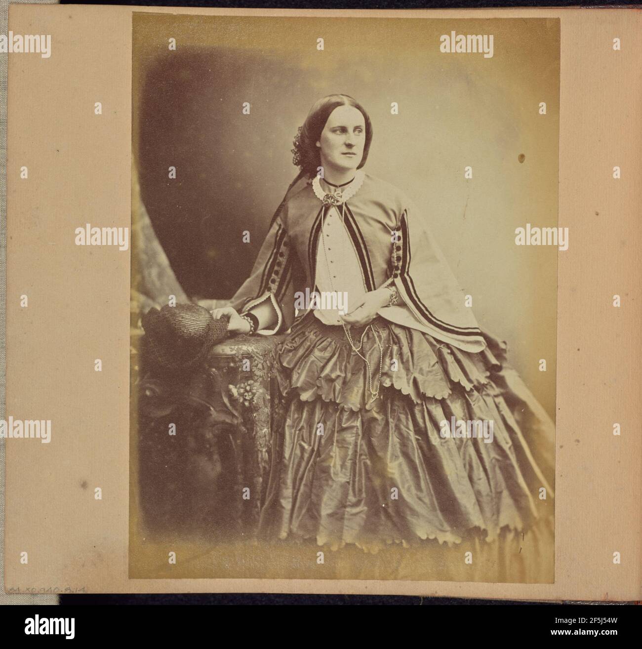 Seated in profile at hi-res stock photography and images - Alamy