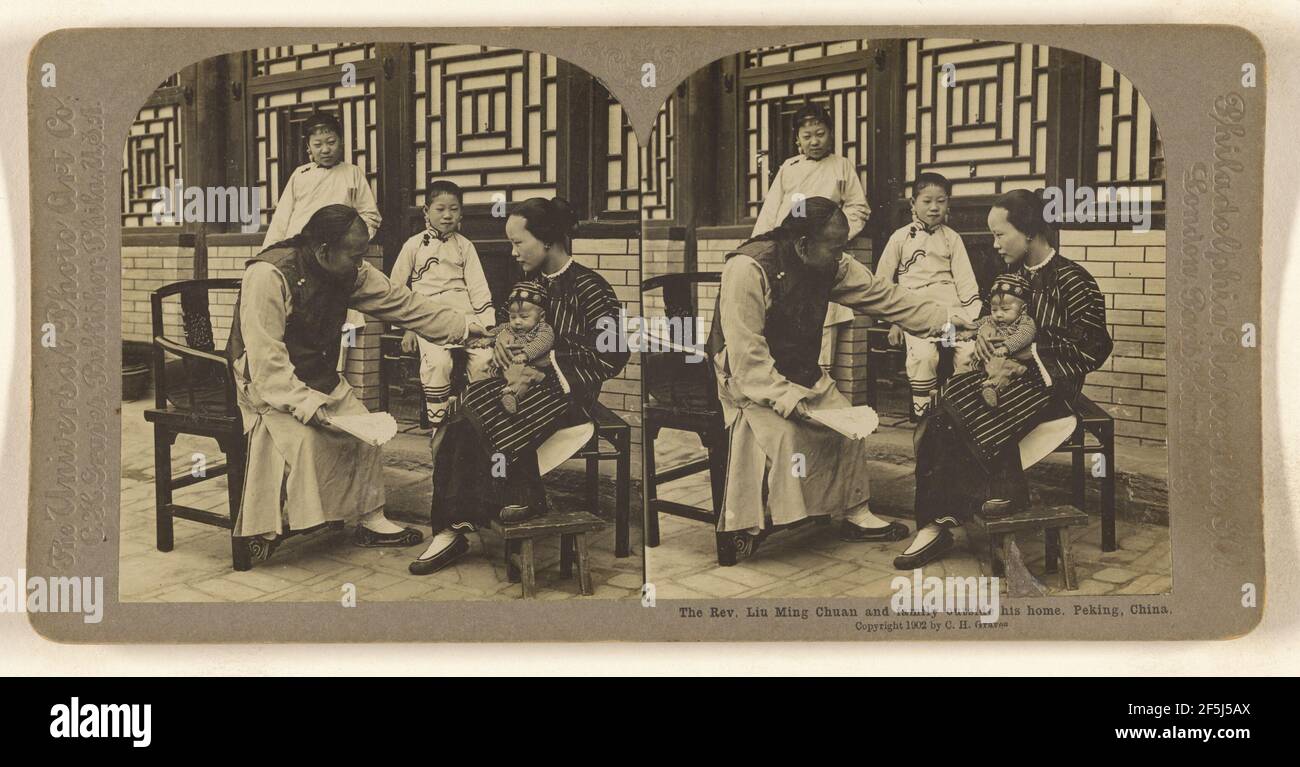 The Rev. Liu Ming Chuan and family outside his home. Peking, China.. Carleton H. Graves ...