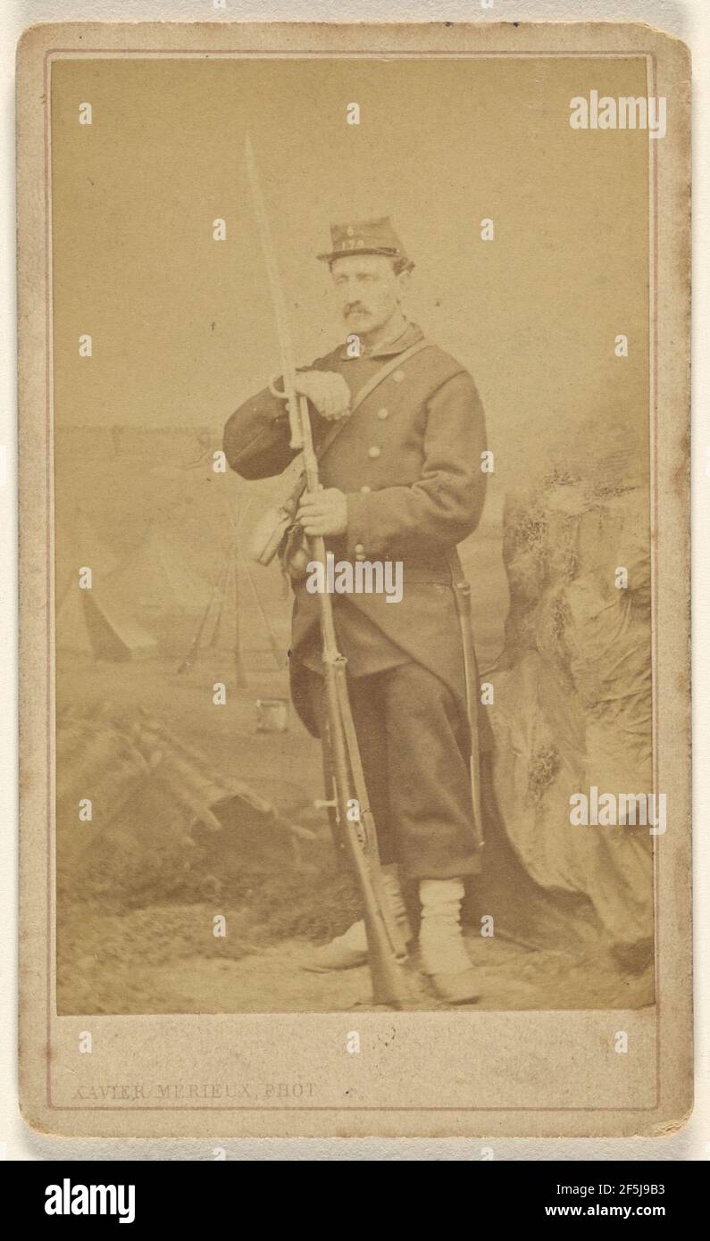Unidentified soldier with moustache, holding rifle with bayonet ...
