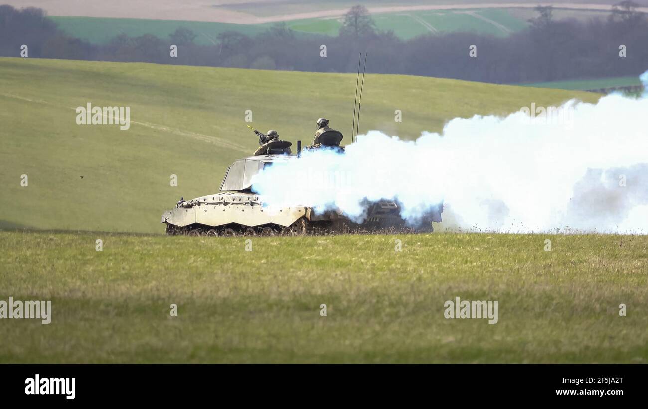 British Army Challenger 2 main battle tank throws out a white smoke ...