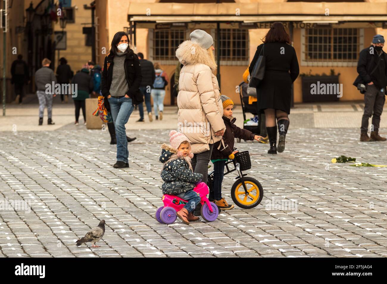 Citizens of Prague view the paintings on the Old Town Square during the ...