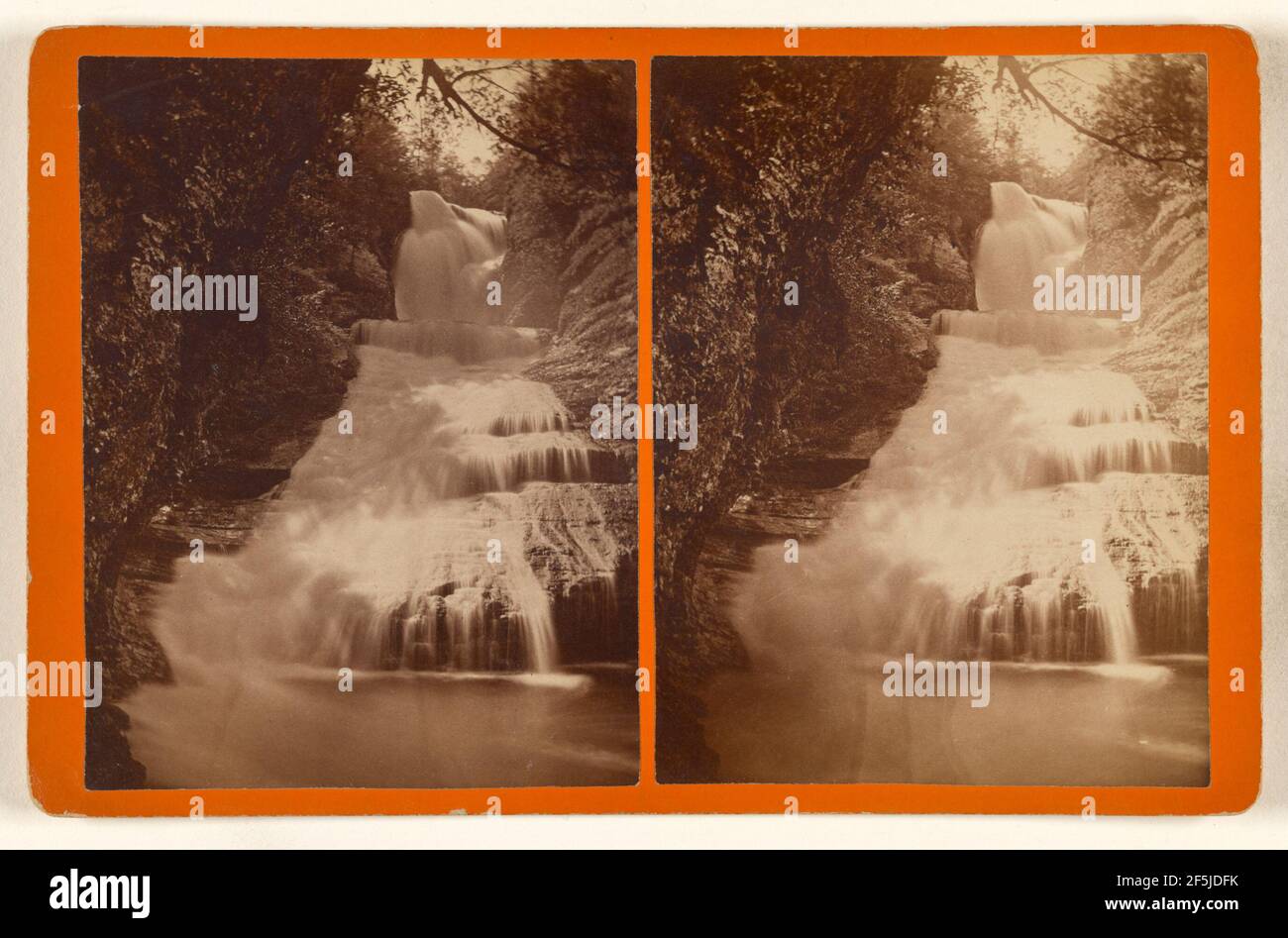 Grand view of Dingmans High Falls with overhanging rocks. Pike County ...