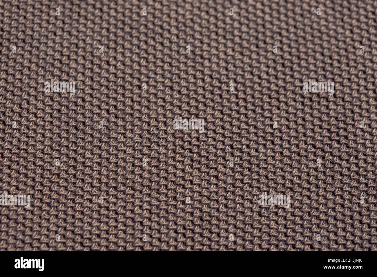 Close-up texture of a knitted fabric of a factory made Stock Photo - Alamy