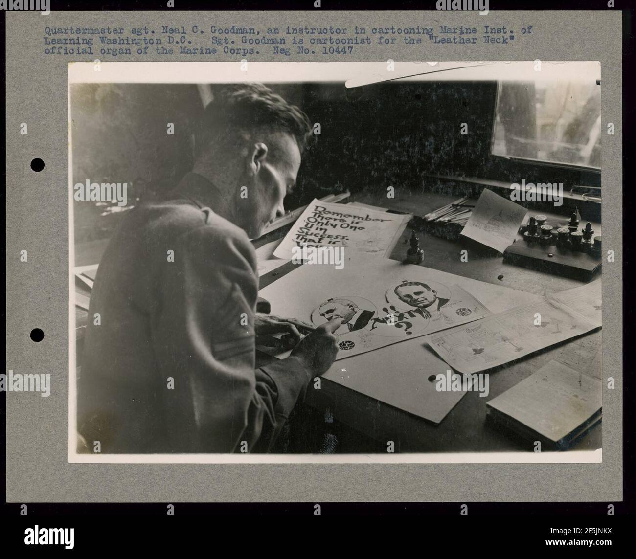 Quartermaster sgt. Neal C. Goodman, an instructor in cartooning Marine ...