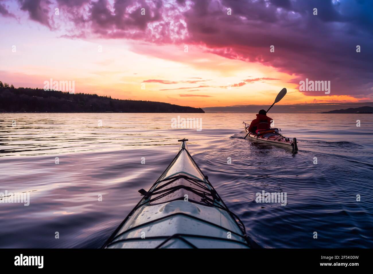 Adventurous Man Sea Kayaking in the Pacific Ocean Stock Photo - Alamy
