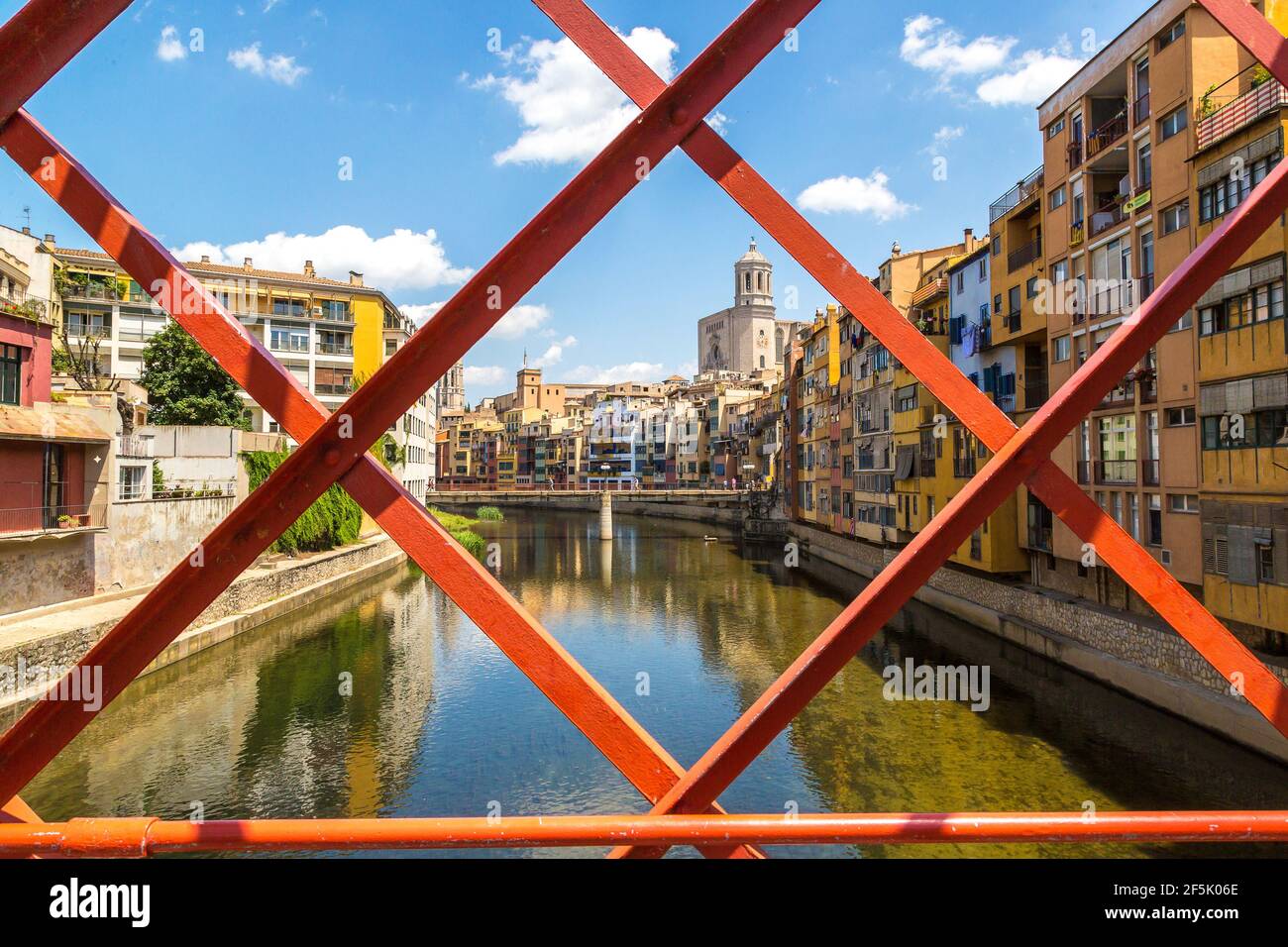 Red iron bridge - Eiffel bridge in Girona, in a beautiful summer day ...