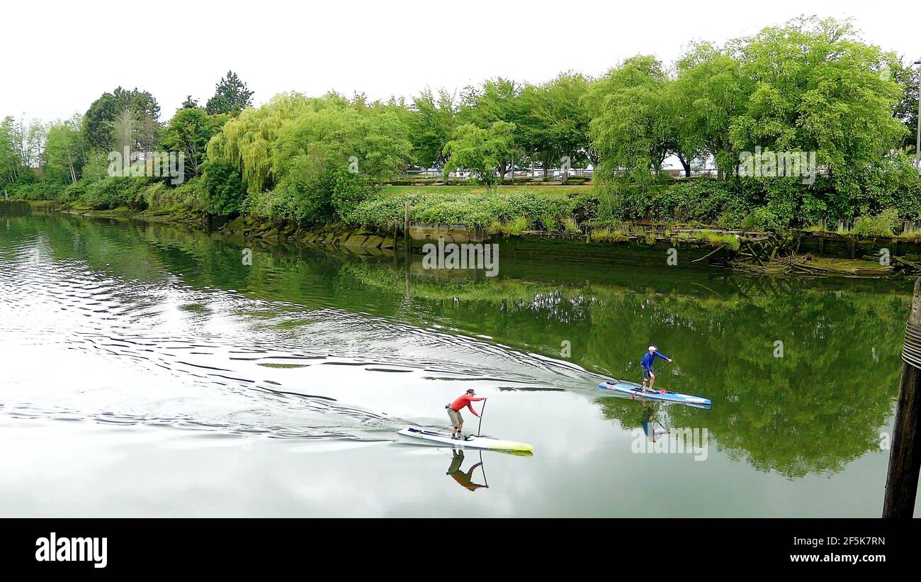 Friends paddle boarding hi-res stock photography and images - Alamy