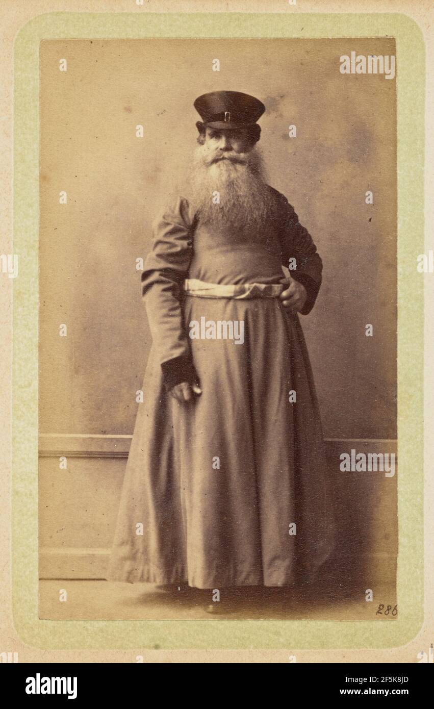 Bearded man dressed in a cassock and hat. William Carrick (Scottish ...