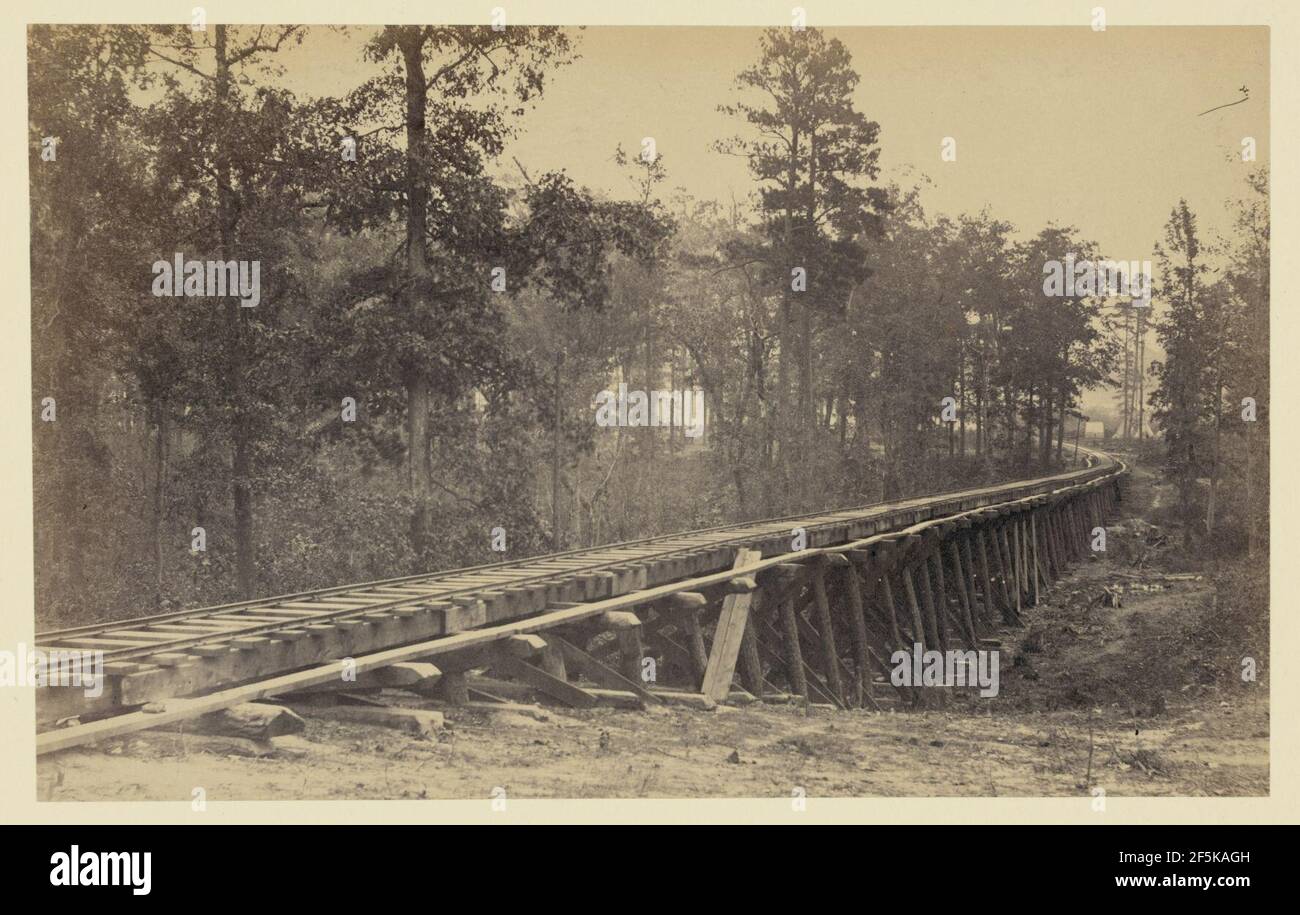 Railroad bridge with timber trestles Stock Photo - Alamy