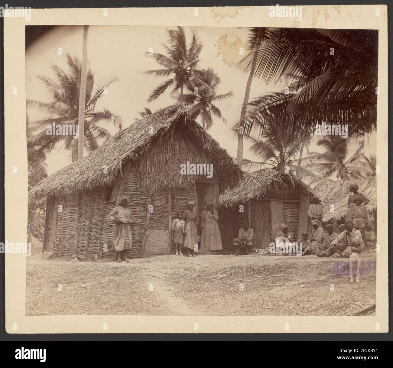 Group in front of huts hi-res stock photography and images - Alamy