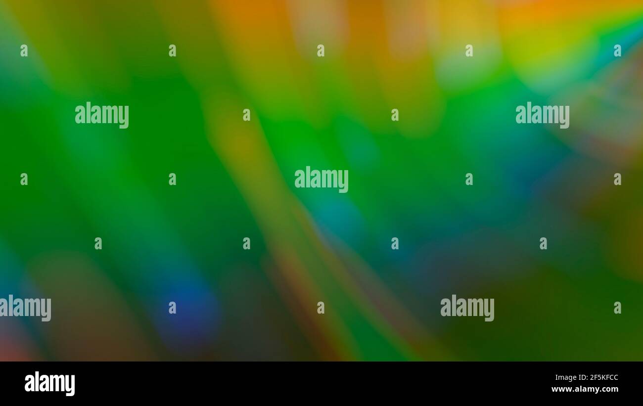 Abstract blurry green background with rainbow highlights Stock Photo ...