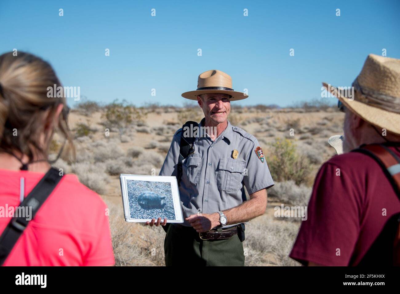 Ranger Keith Flood shows a picture of a tortoise (16026293723 Stock ...