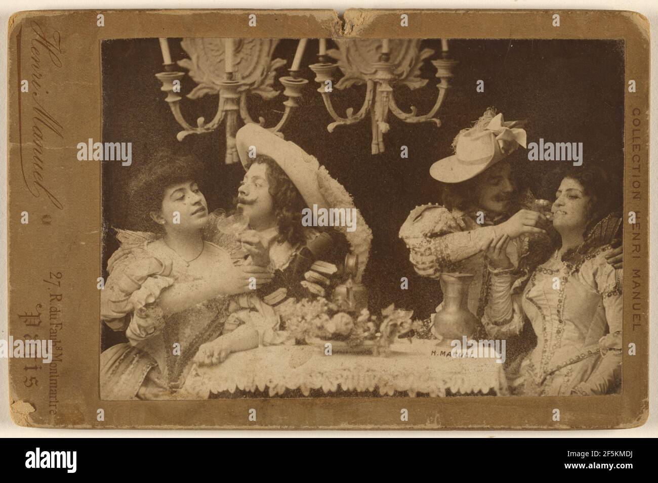 Tableau of two cavaliers with two women feasting at a table. Henri ...