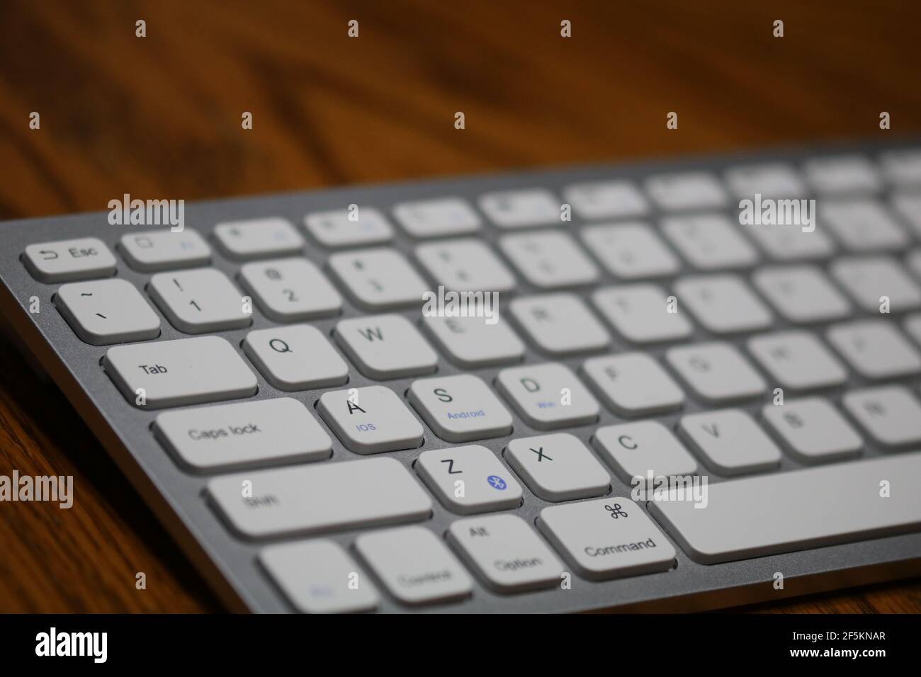 Small keyboard on a desk Stock Photo - Alamy