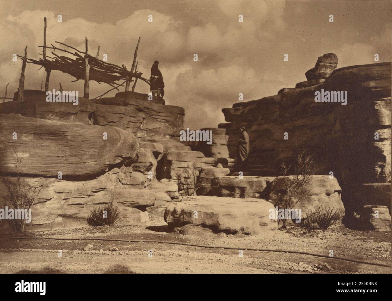 Figure on Rocks with Shelter. Frederick I. Monsen (American, 1865 ...