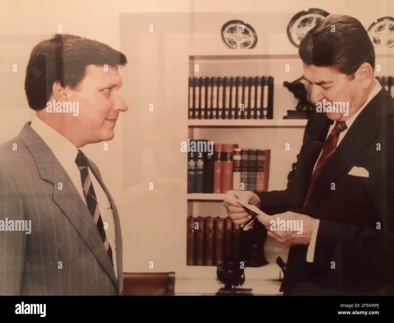 Reagan reading Martin cards prior to Oval Office meeting Stock Photo ...