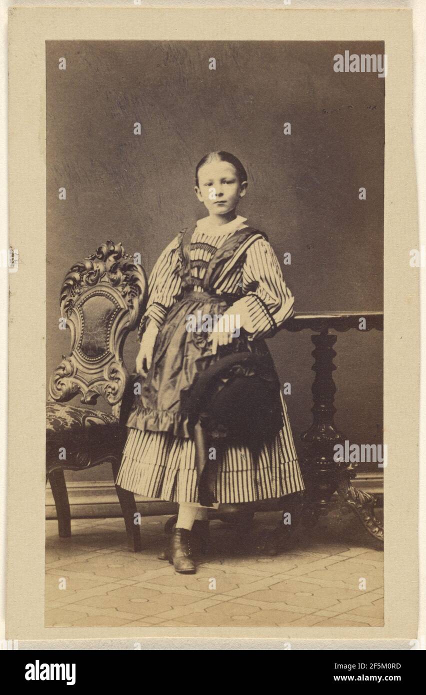 Unidentified girl, standing. Unknown Stock Photo - Alamy