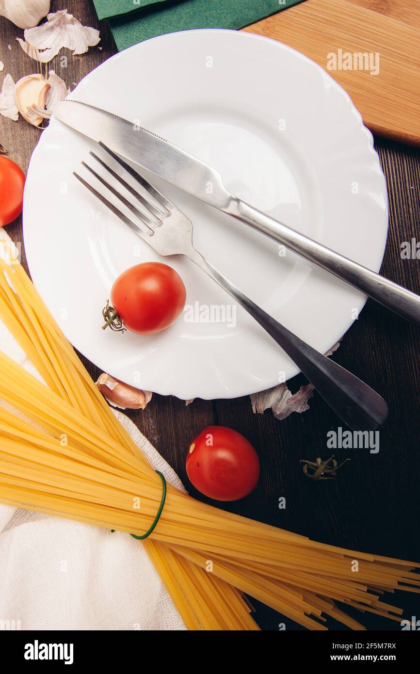 cooking italian food pasta kitchen utensils on wooden table Stock Photo ...