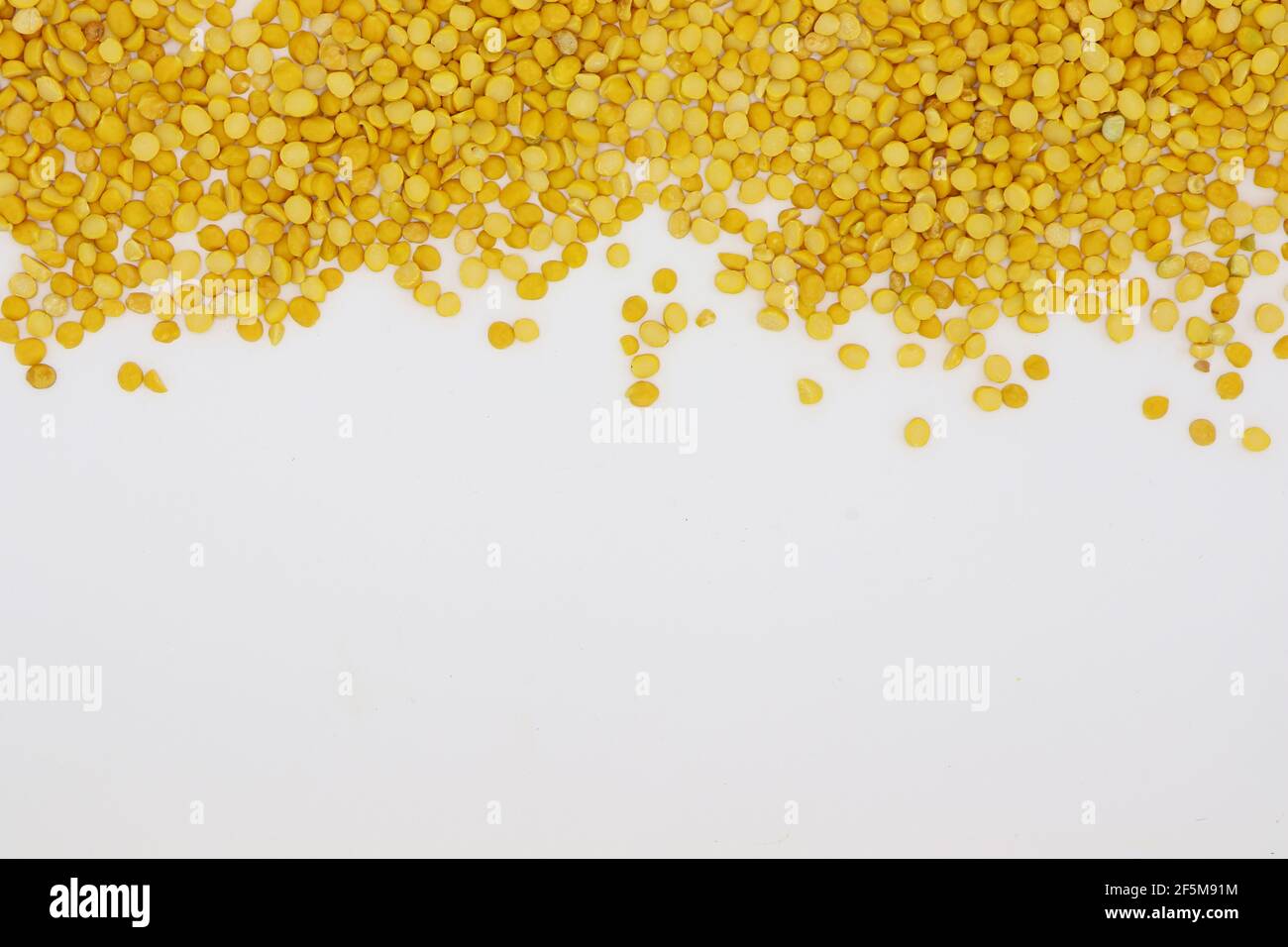 Daal Chana, Heap of yellow split chickpeas isolated on white background ...