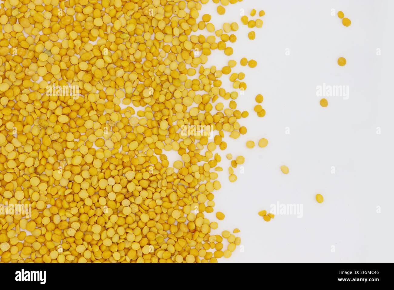 Daal Chana, Heap of yellow split chickpeas isolated on white background ...