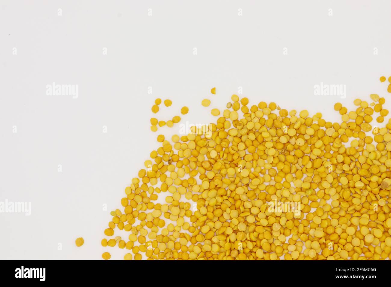 Daal Chana, Heap of yellow split chickpeas isolated on white background ...
