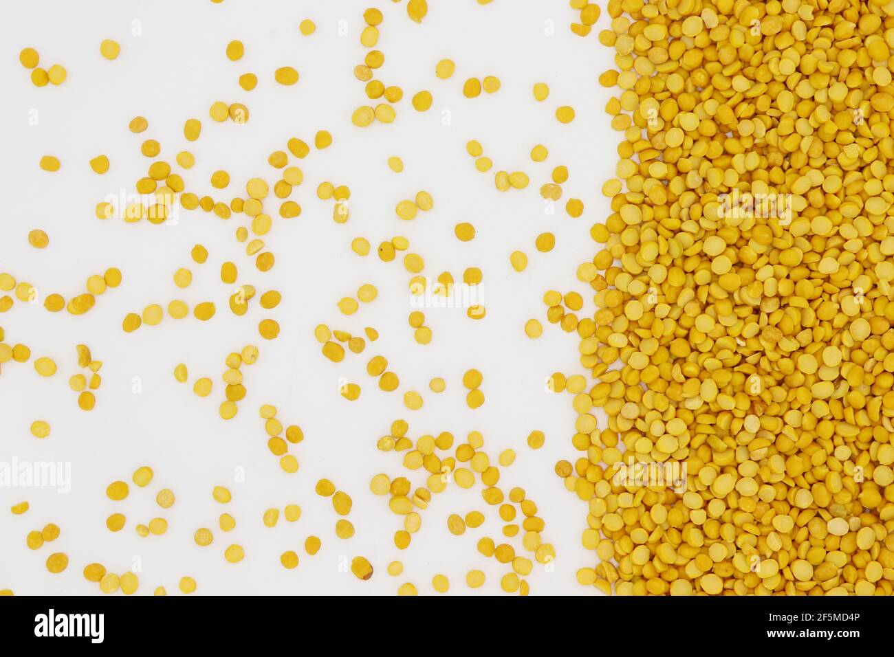 Daal Chana, Heap of yellow split chickpeas isolated on white background ...