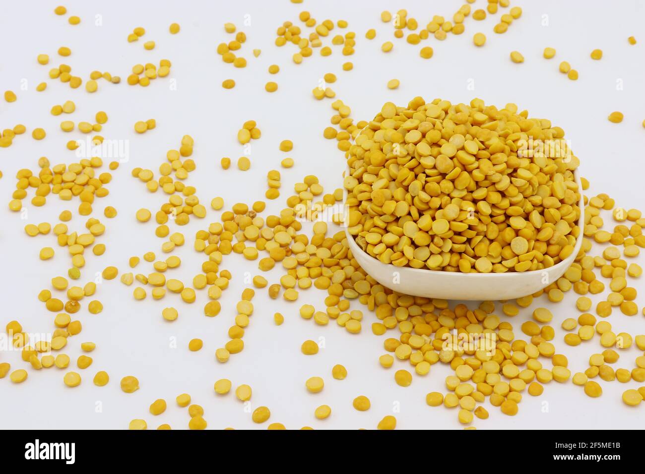chickpea Also Know as Chana Daal in a white white little bowl isolated ...