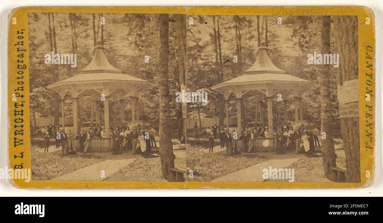 Group of people standing in or around a gazebo. Benjamin L. Wright ...