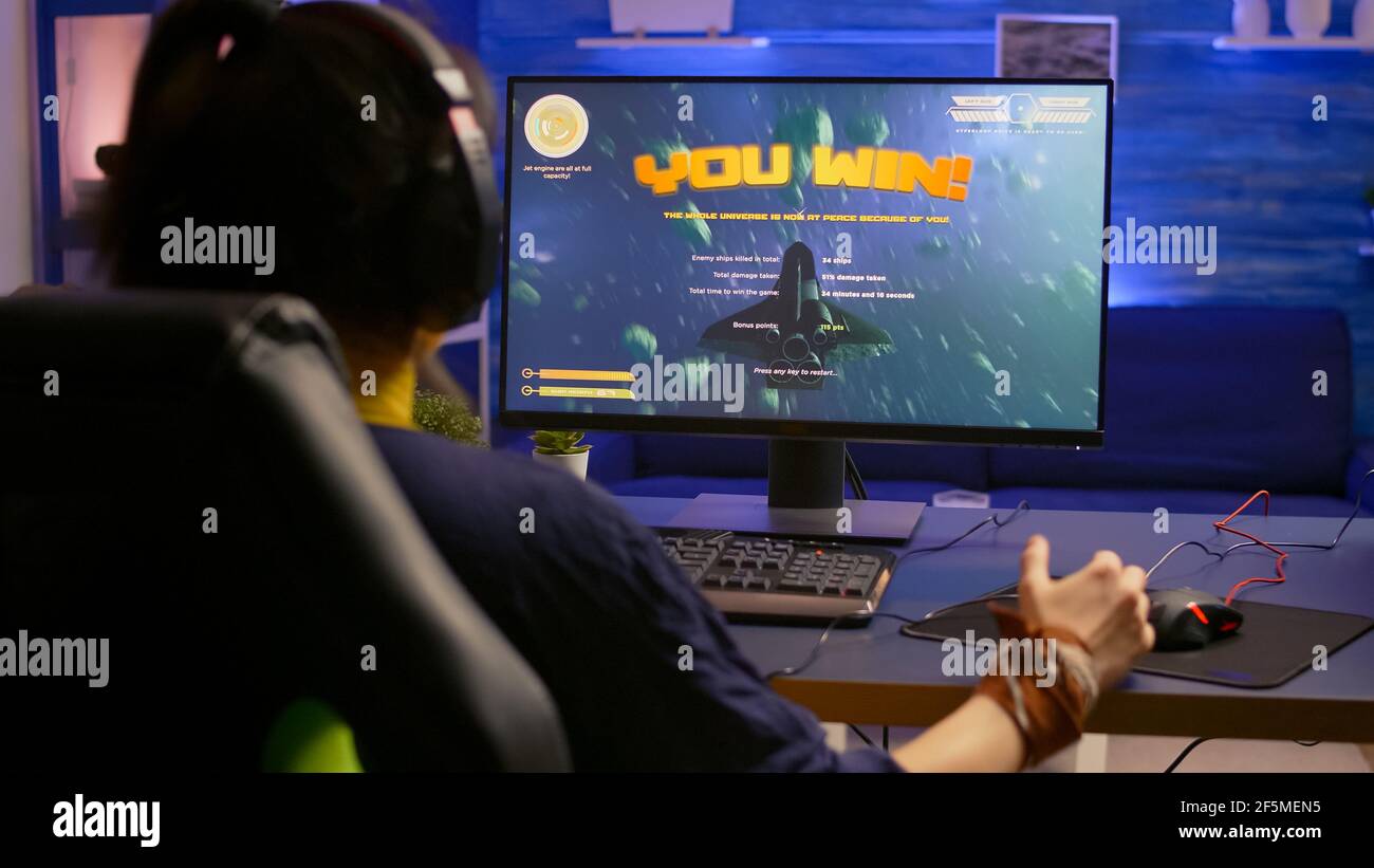 Pro gamer making winner gesture hi-res stock photography and images - Alamy