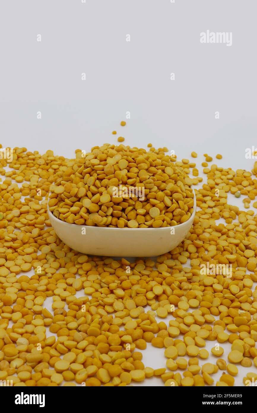 chickpea Also Know as Chana Daal in a white white little bowl isolated ...