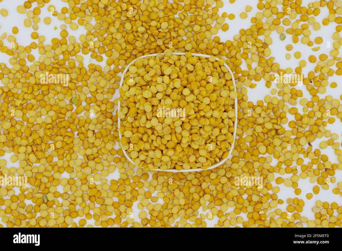 chickpea Also Know as Chana Daal in a white white little bowl isolated ...