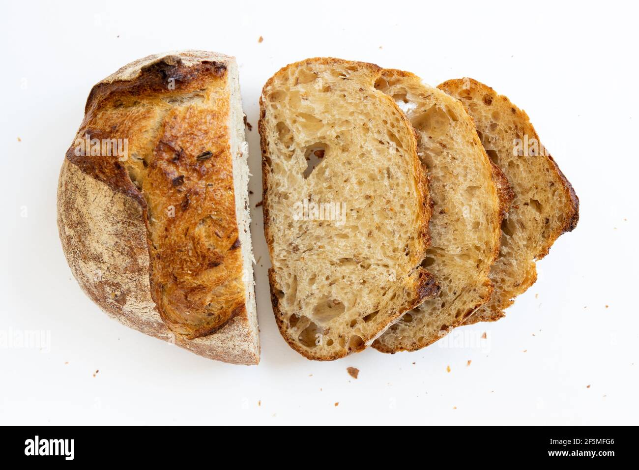 Loaf bread with slices bread on white background top view. Fresh ...