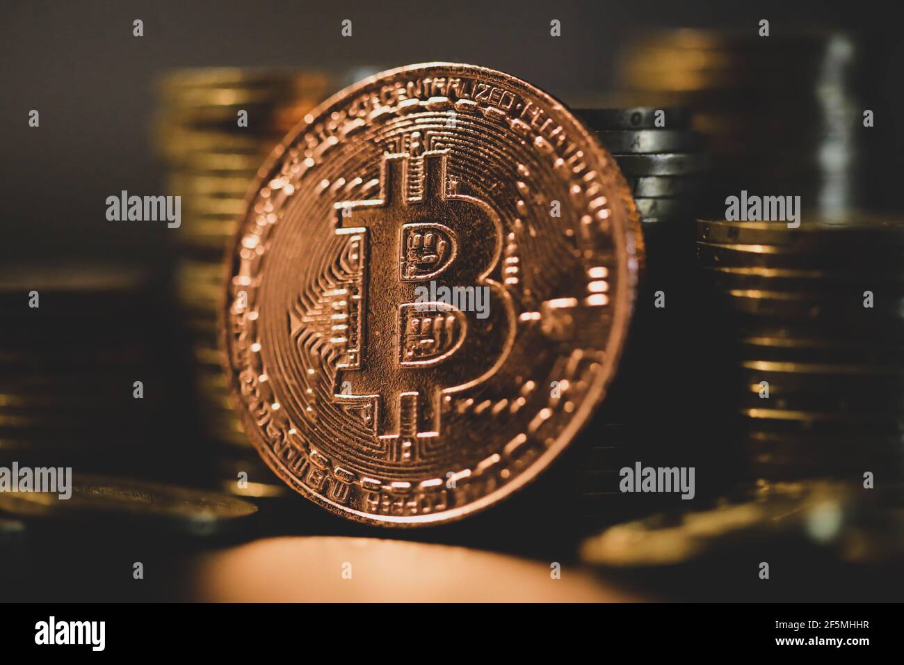 Shallow depth of field (selective focus) image with a Bitcoin metal ...