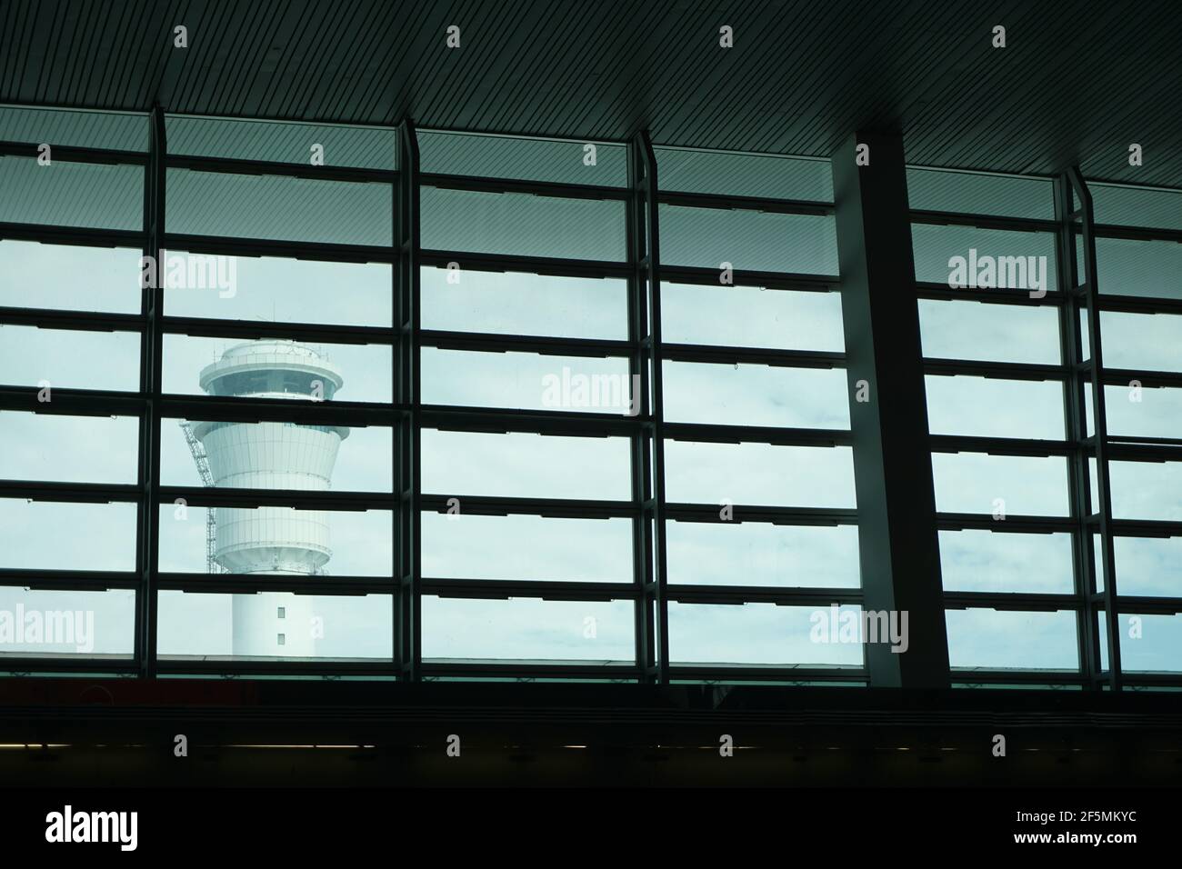 airport control tower viewed through window Stock Photo - Alamy