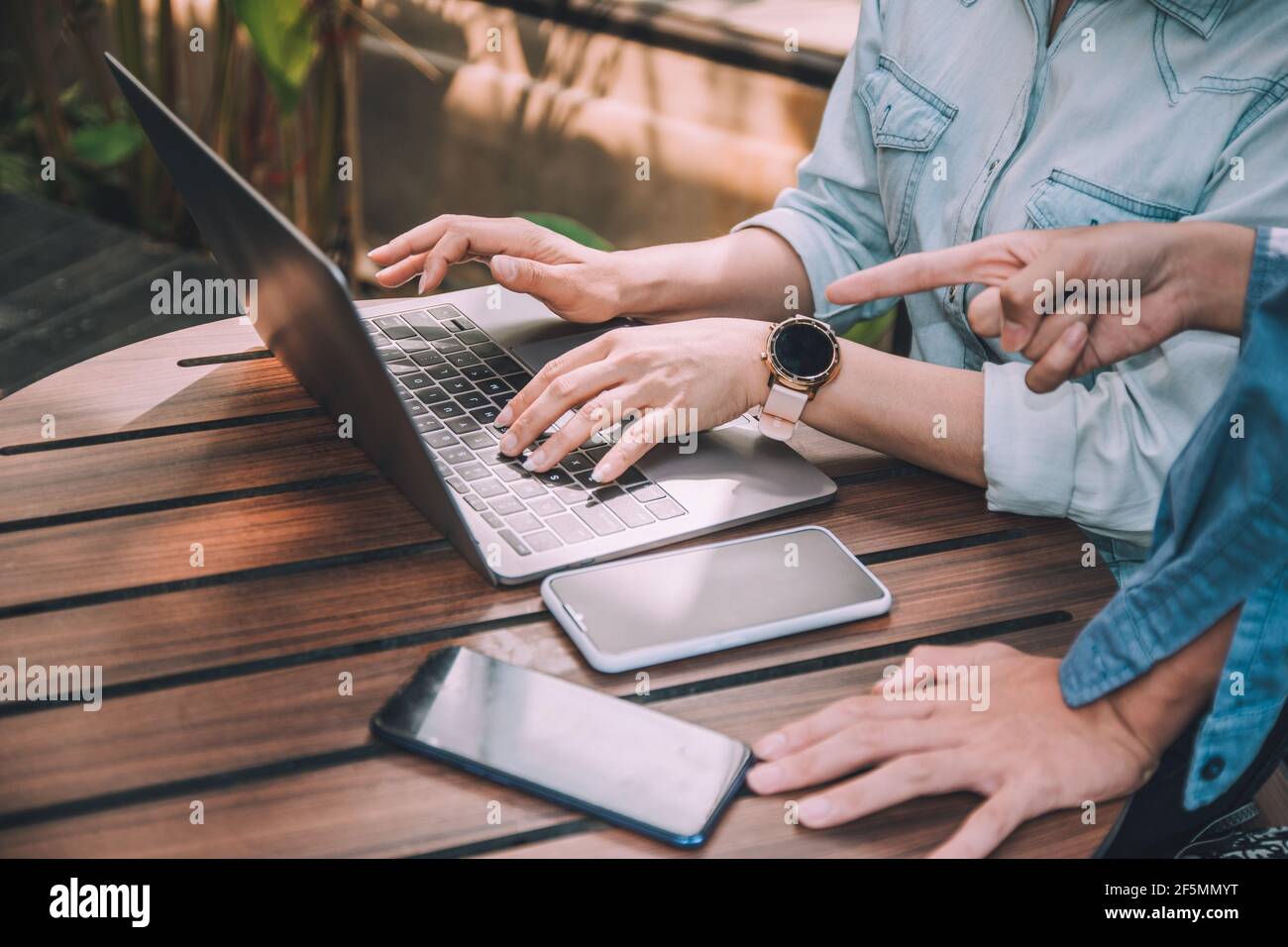 people use computer notebook work freelance in cafe, Man explain women ...