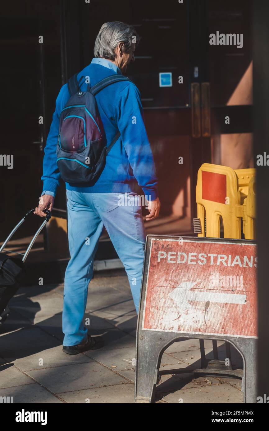 Shepherd's Bush, London | UK - 2021.03.22: Pedestrian walking on the ...