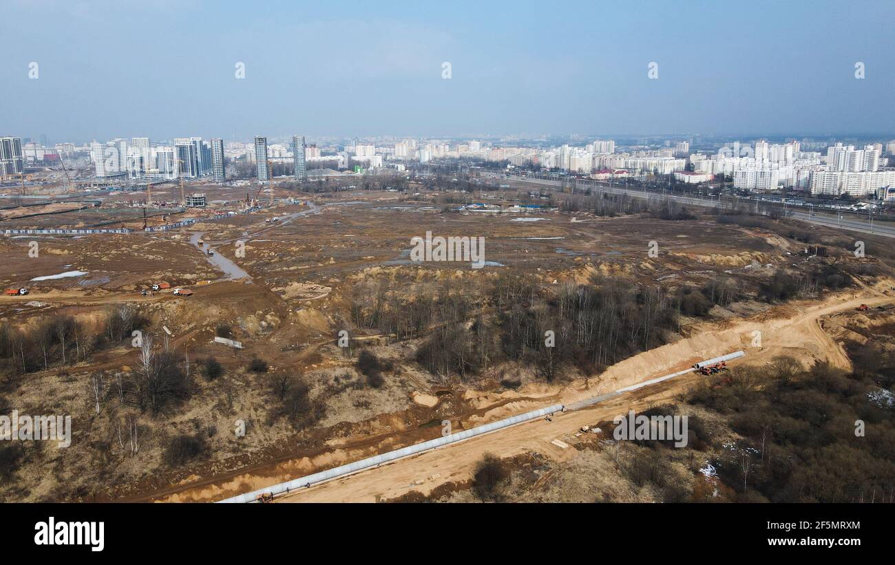 Construction of a large residential area. The construction site is ...