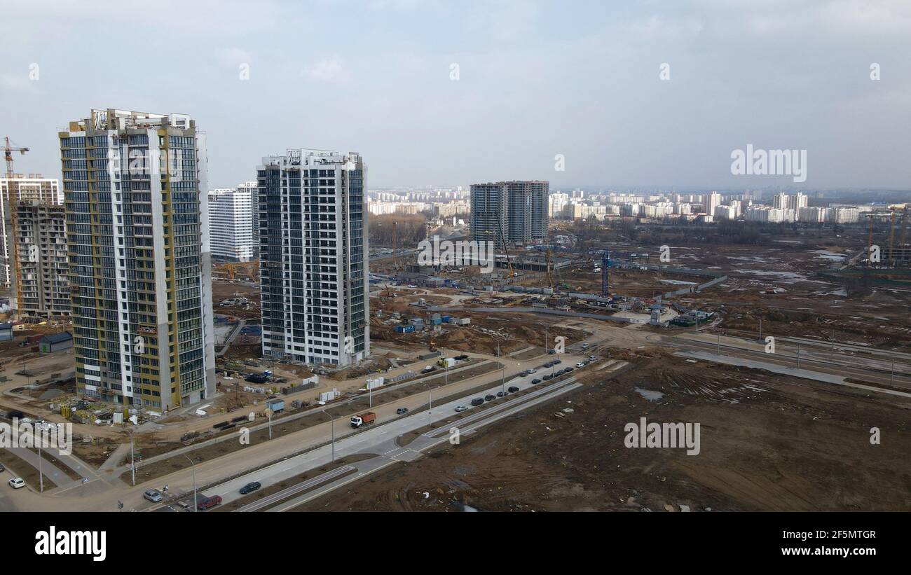 Construction of a large residential area. The construction site is ...