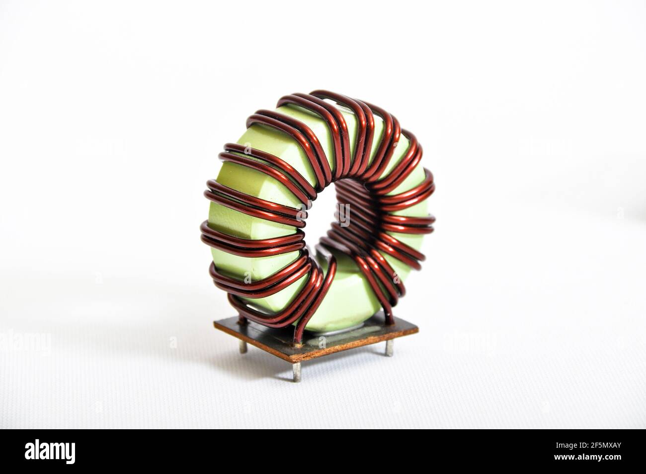 Transformer copper wire coil isolated on a white background Stock Photo ...