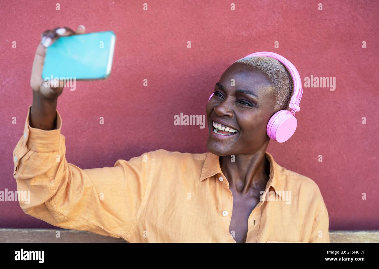 Happy African Woman Taking Selfie With Mobile Smartphone While