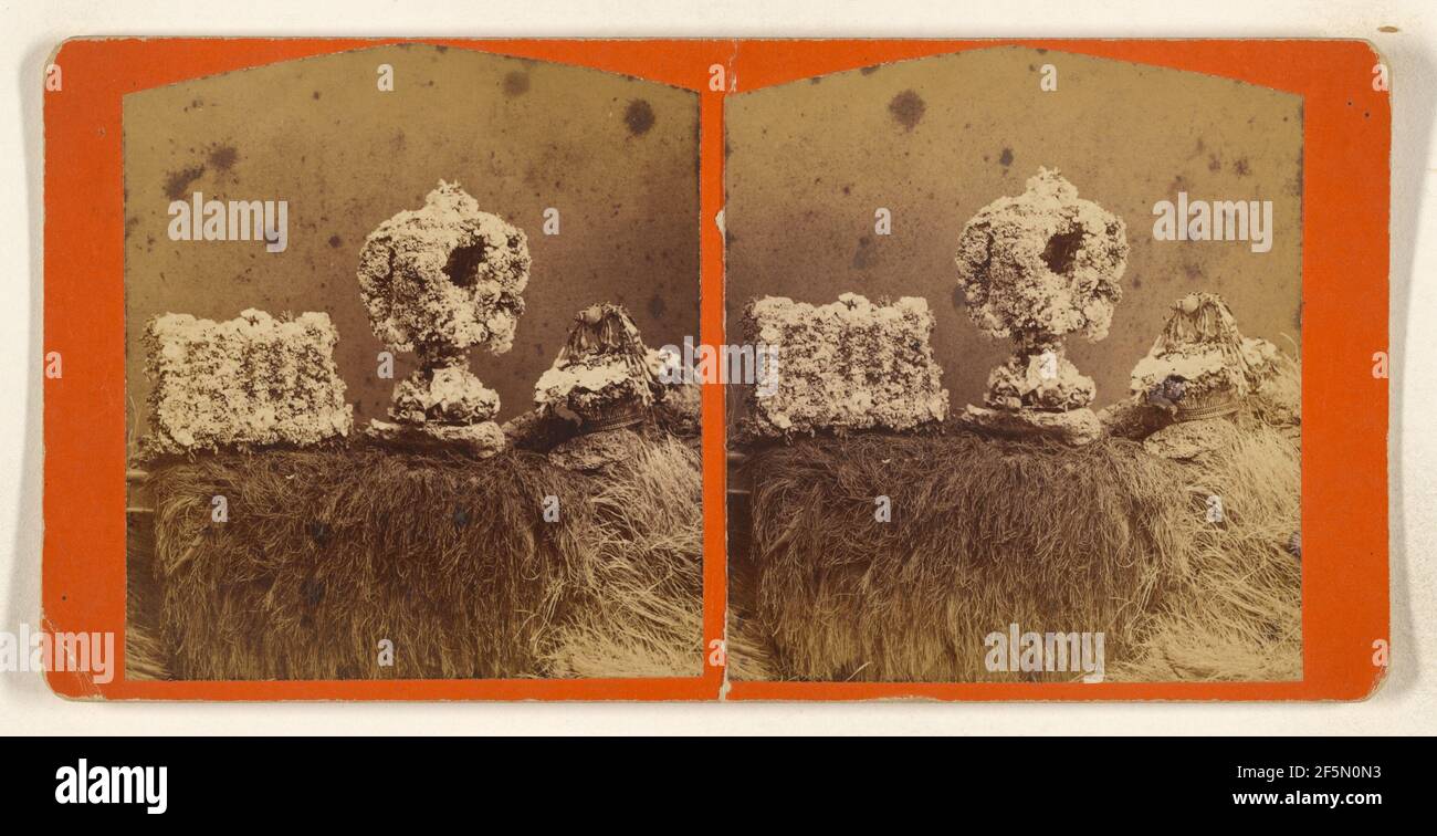 Three dried flower arrangements atop haystacks. Bonta & Curtiss Stock ...