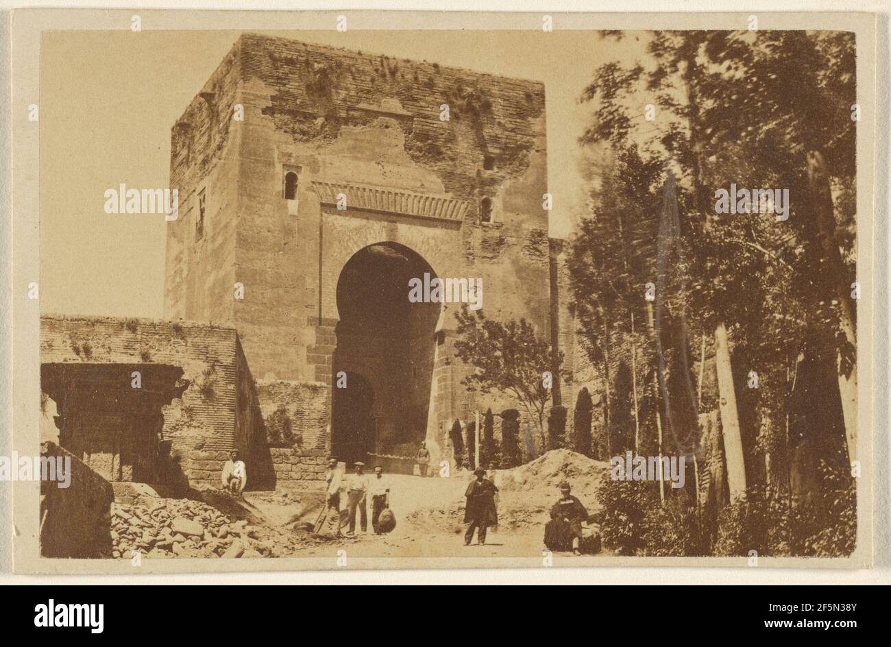 The entrance to the Alhambra, with workmen in front. Unknown Stock ...